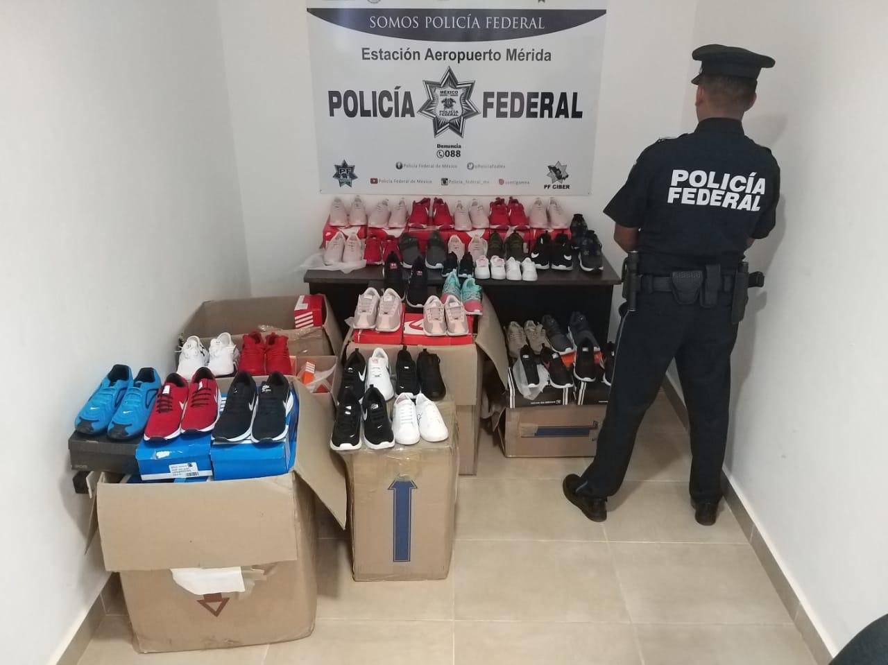Aseguran buche de totoaba y tenis Nike chafa, en el Aeropuerto de Mérida
